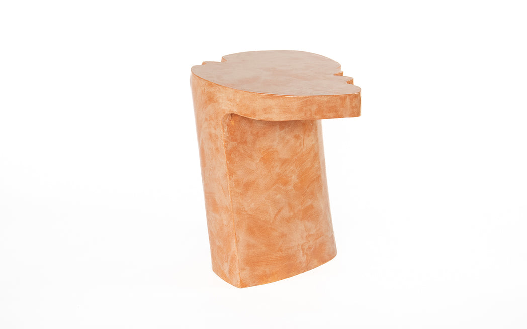 Liquid stone side table in speckled peach glaze by Floris Wubben | SCP
